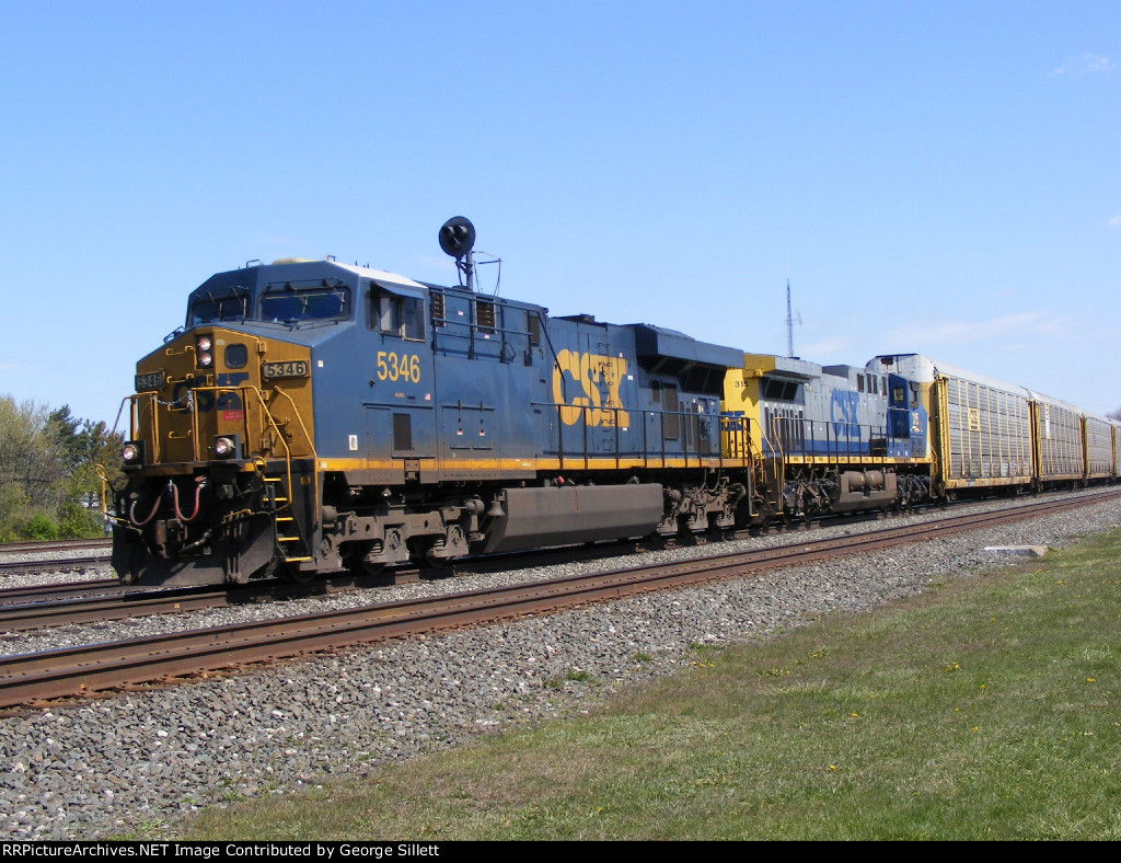CSX 5346 powers a string of empty autoracks west.